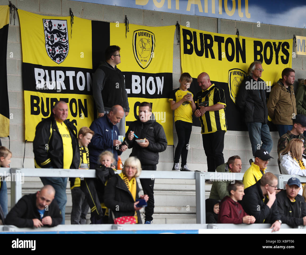 Burton Albion fans in the stands before kick off at the Pirelli Stadium ...