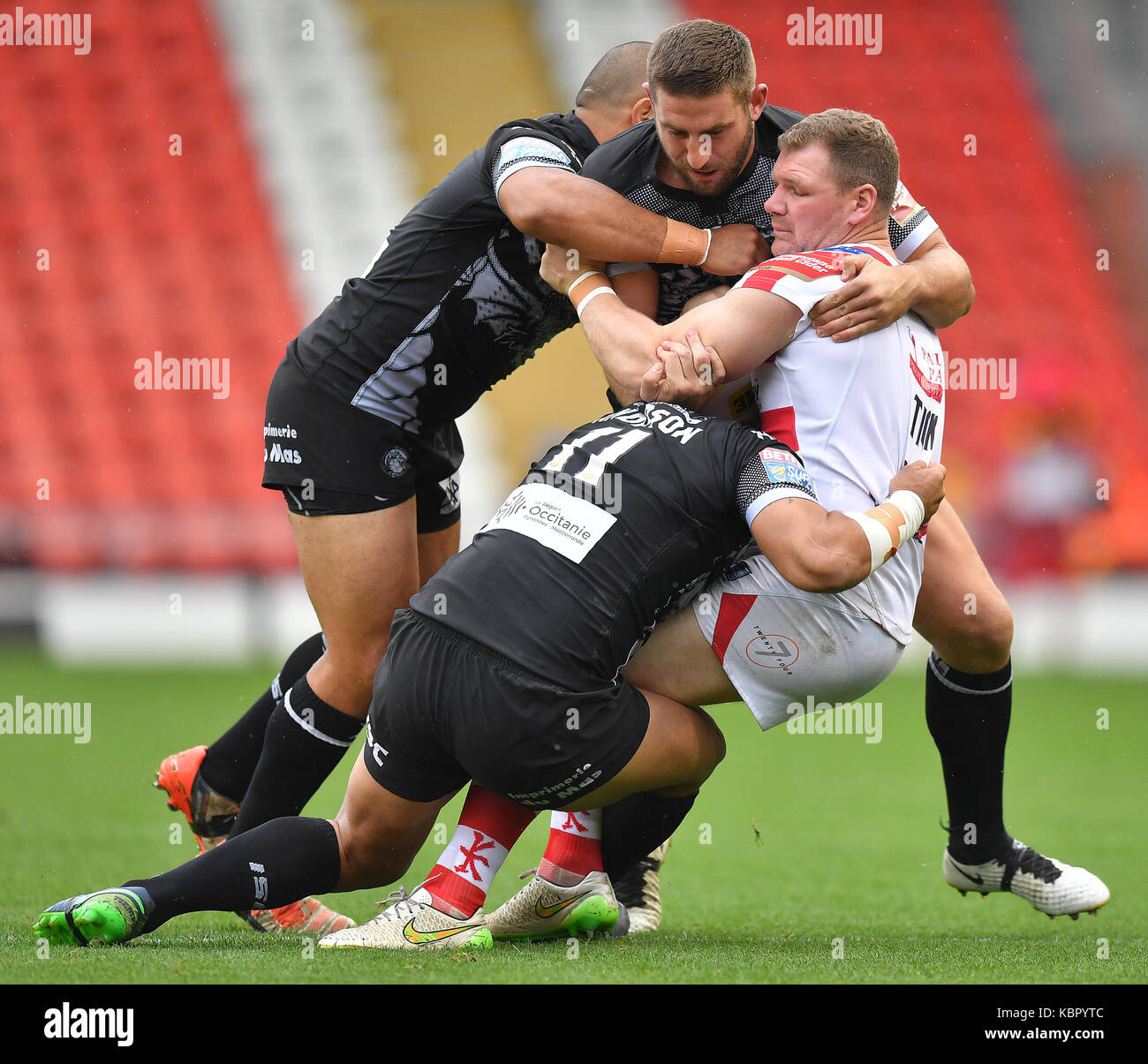 Leigh Centurions' Danny Tickle is tackled by Catalans Dragons' Julian ...