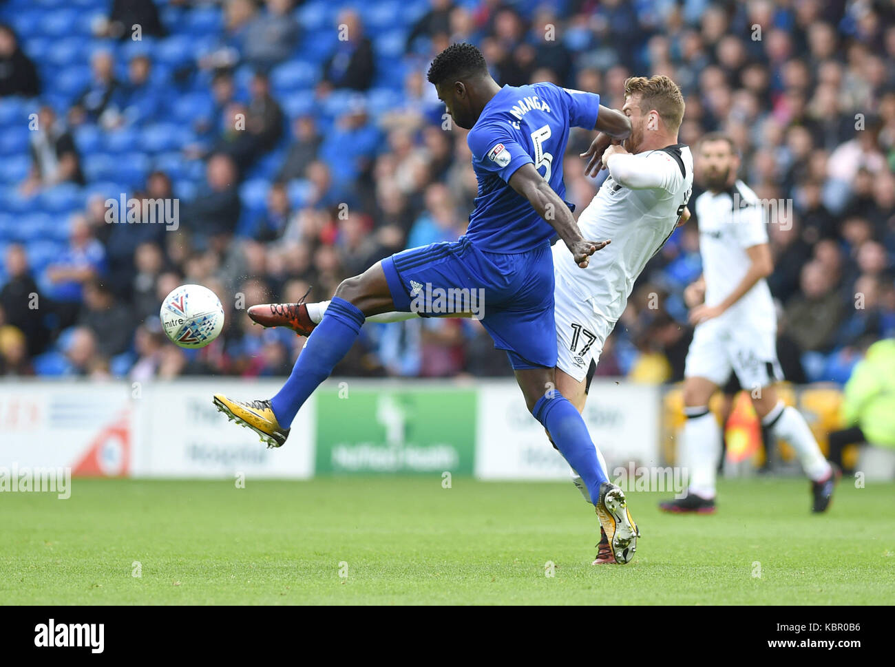 Cardiff City's Bruno Ecuele Manga and Derby County's Sam Winnall battle ...