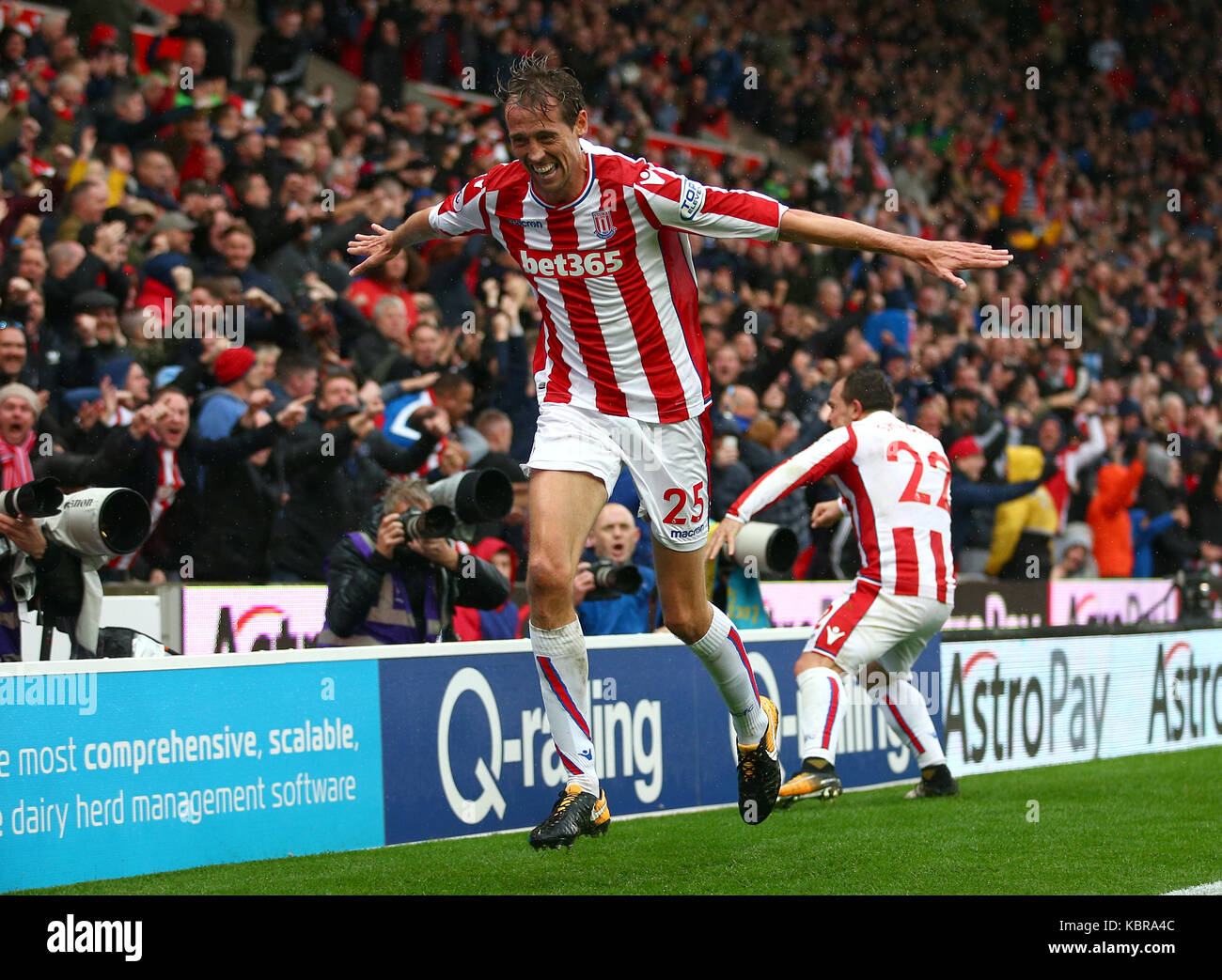 Stoke City's Peter Crouch (left) celebrates scoring his side's second ...