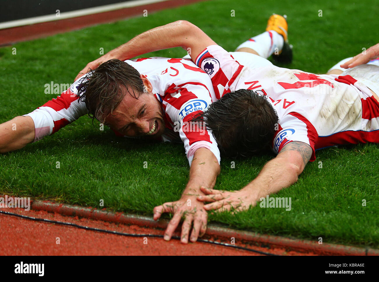 Stoke City's Peter Crouch (left) celebrates scoring his side's second ...