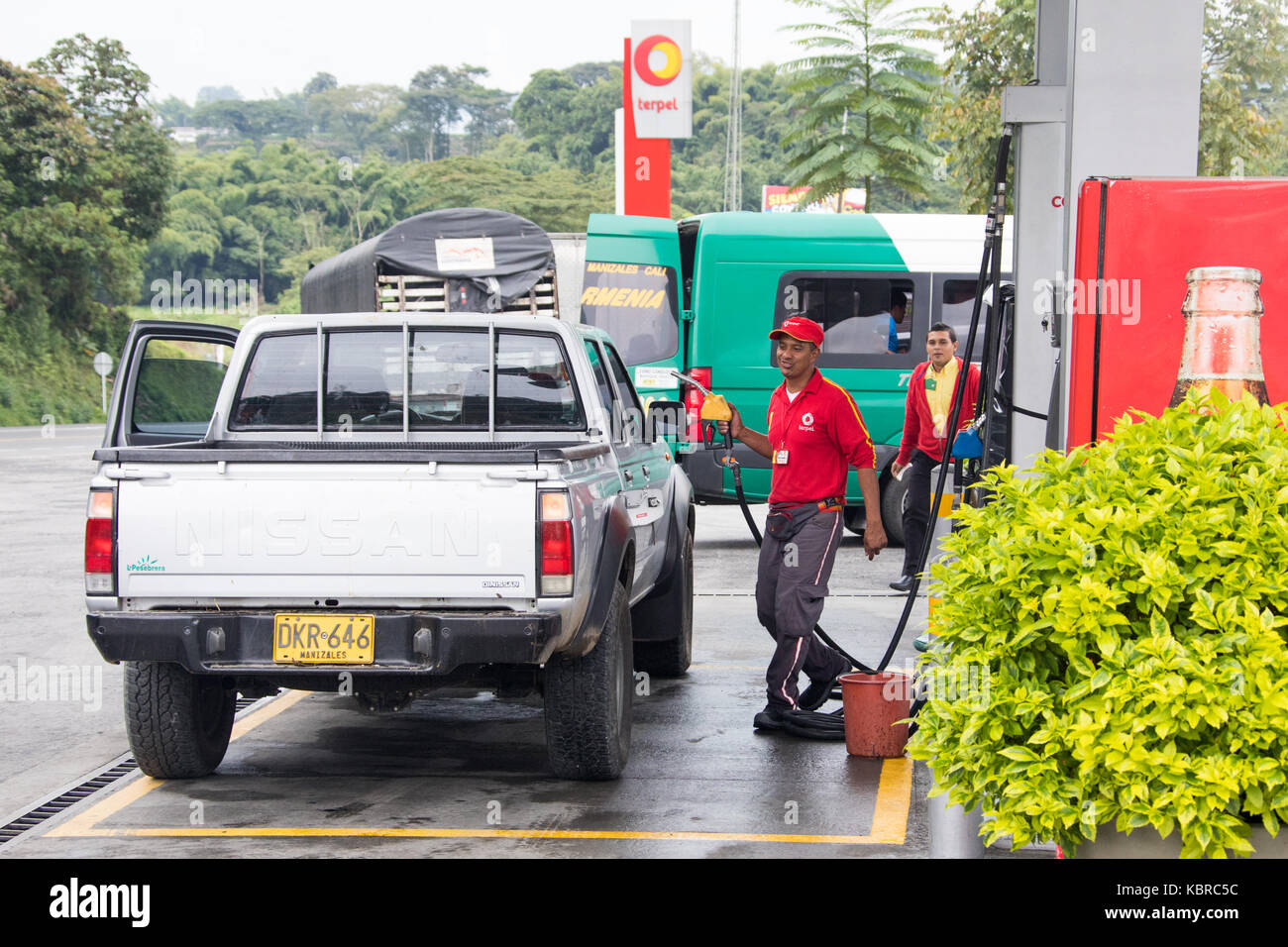 Filling up at a gas station in Chinchina, Colombia Stock Photo - Alamy