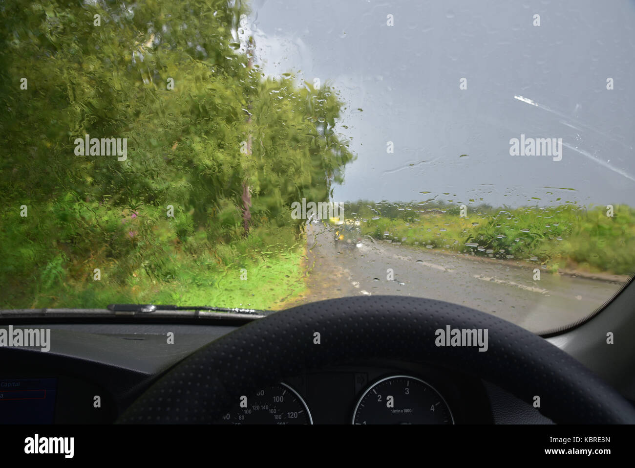 Rain drops on vehicles window soft focus Stock Photo - Alamy