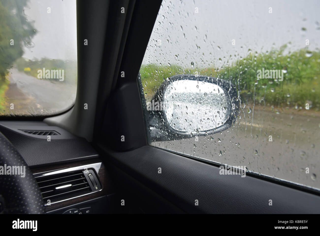 Rain drops on vehicles window soft focus Stock Photo - Alamy