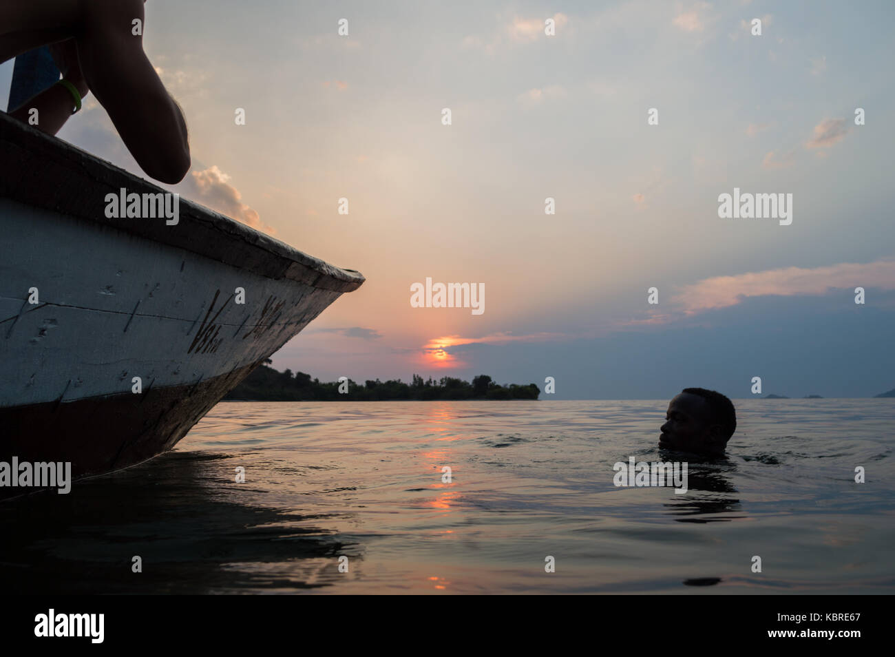 Sunset Boat Ride on Lake Kivu, Kibuye, Rwanda Stock Photo - Alamy