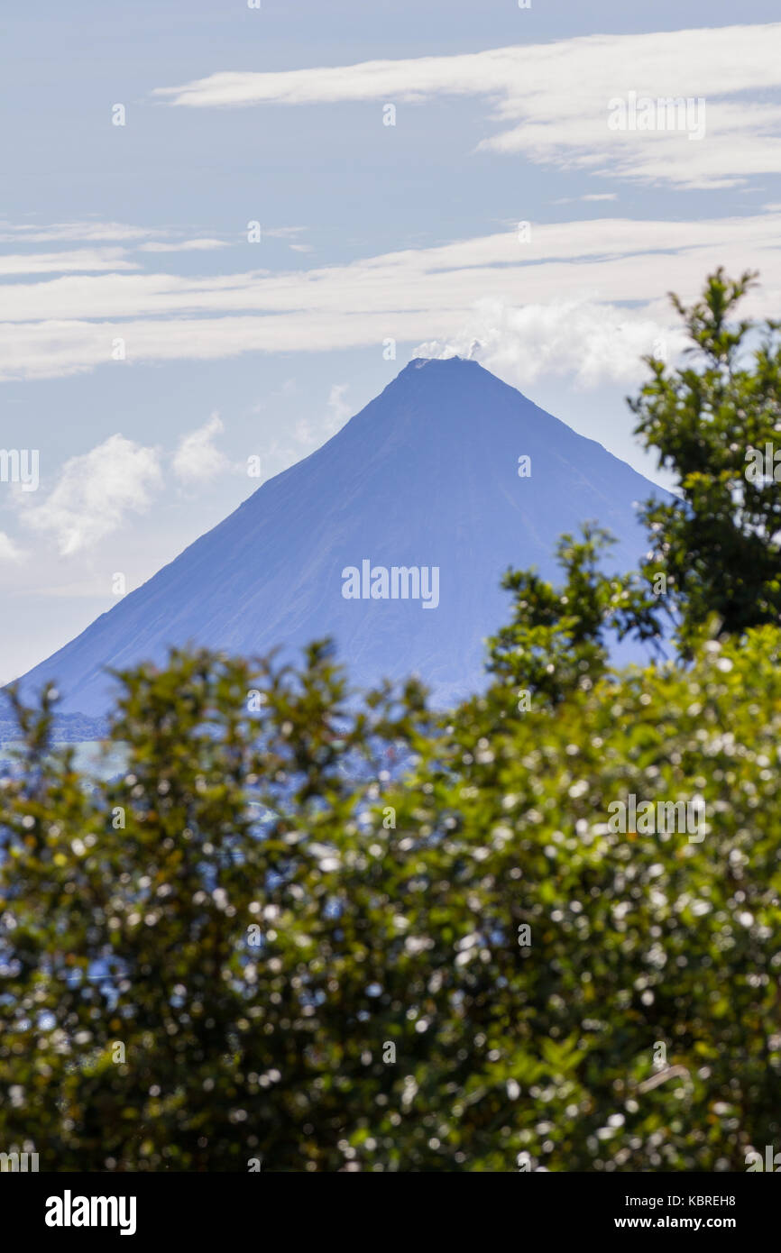 clear afternoon view of the Arenal volcano from across the lake Stock ...