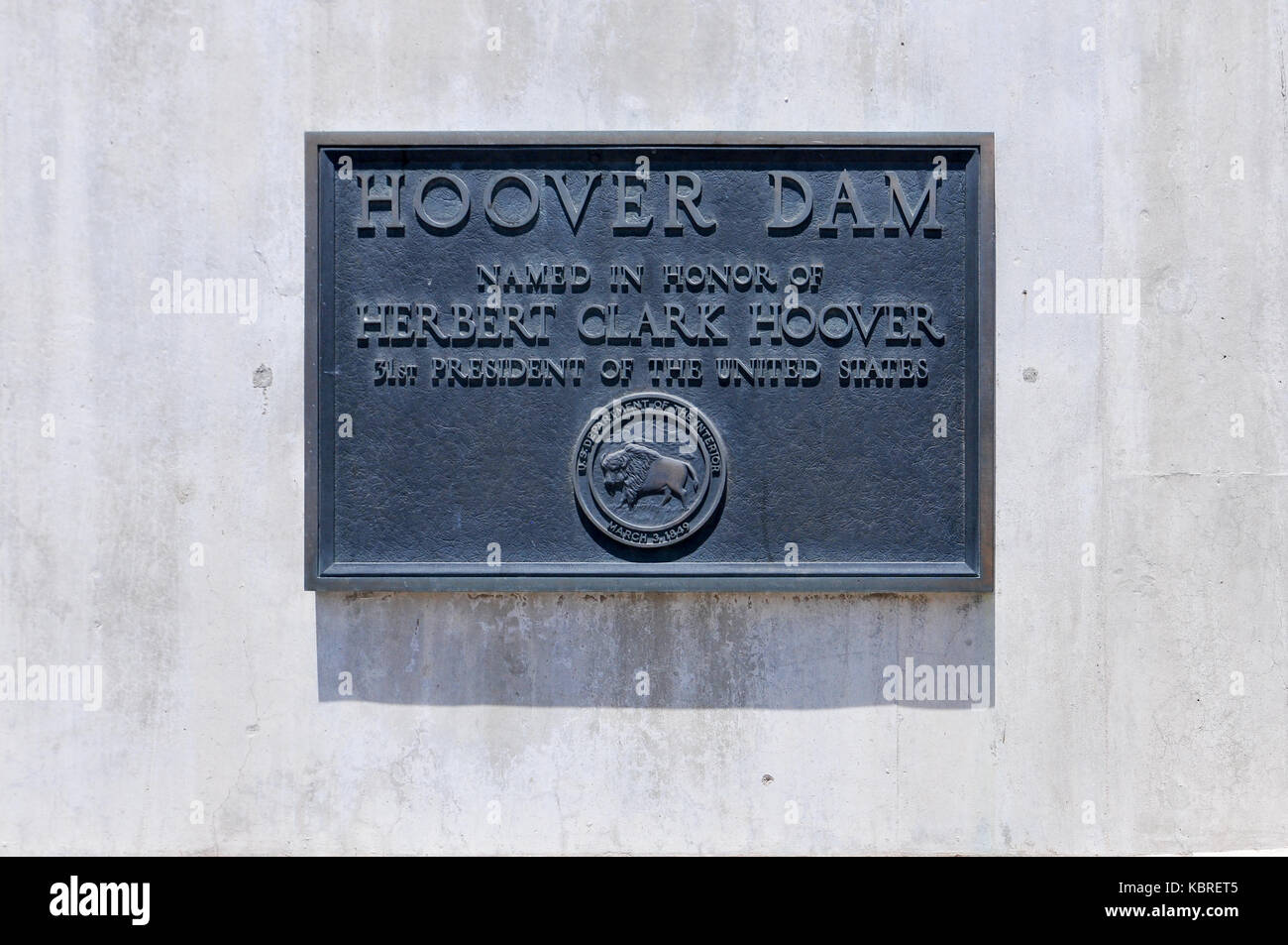 Sign to Hoover Dam, originally known as Boulder Dam, a concrete arch ...
