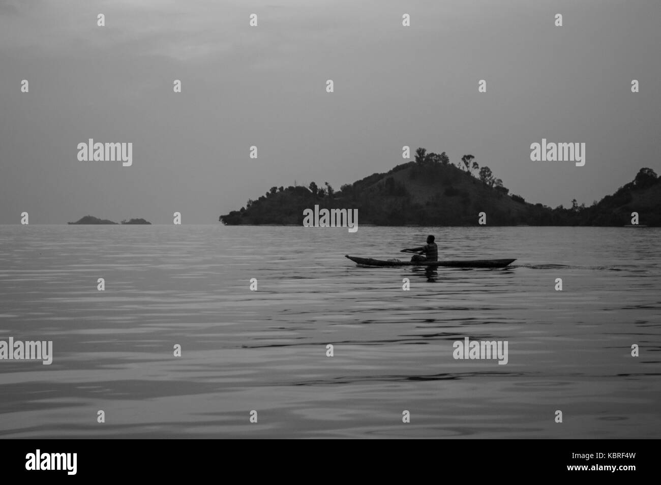 Man on a Kayak, Lake Kivu, Kibuye, Rwanda Stock Photo - Alamy