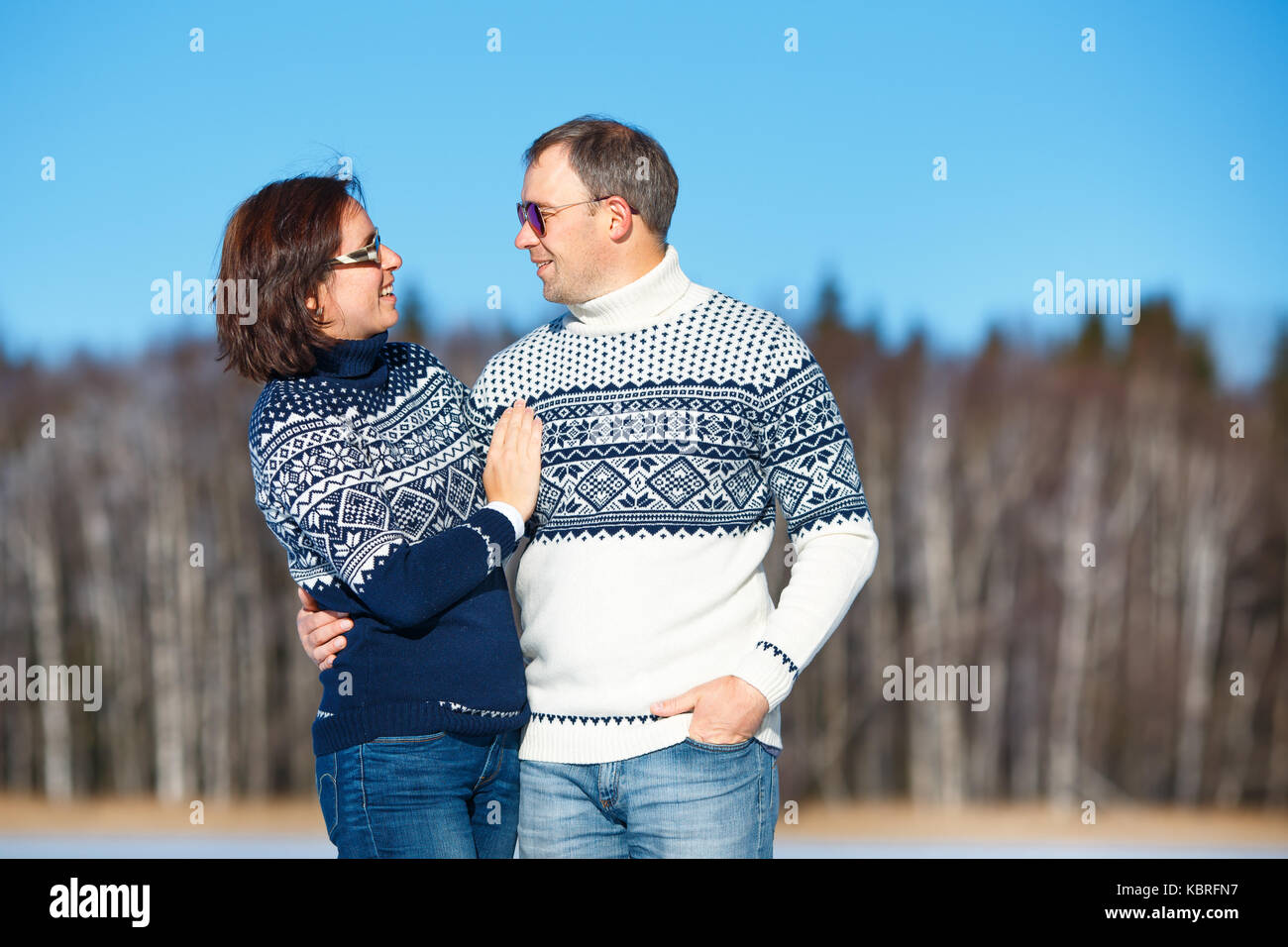 Positive smiling happy dating couple outdoors Stock Photo - Alamy