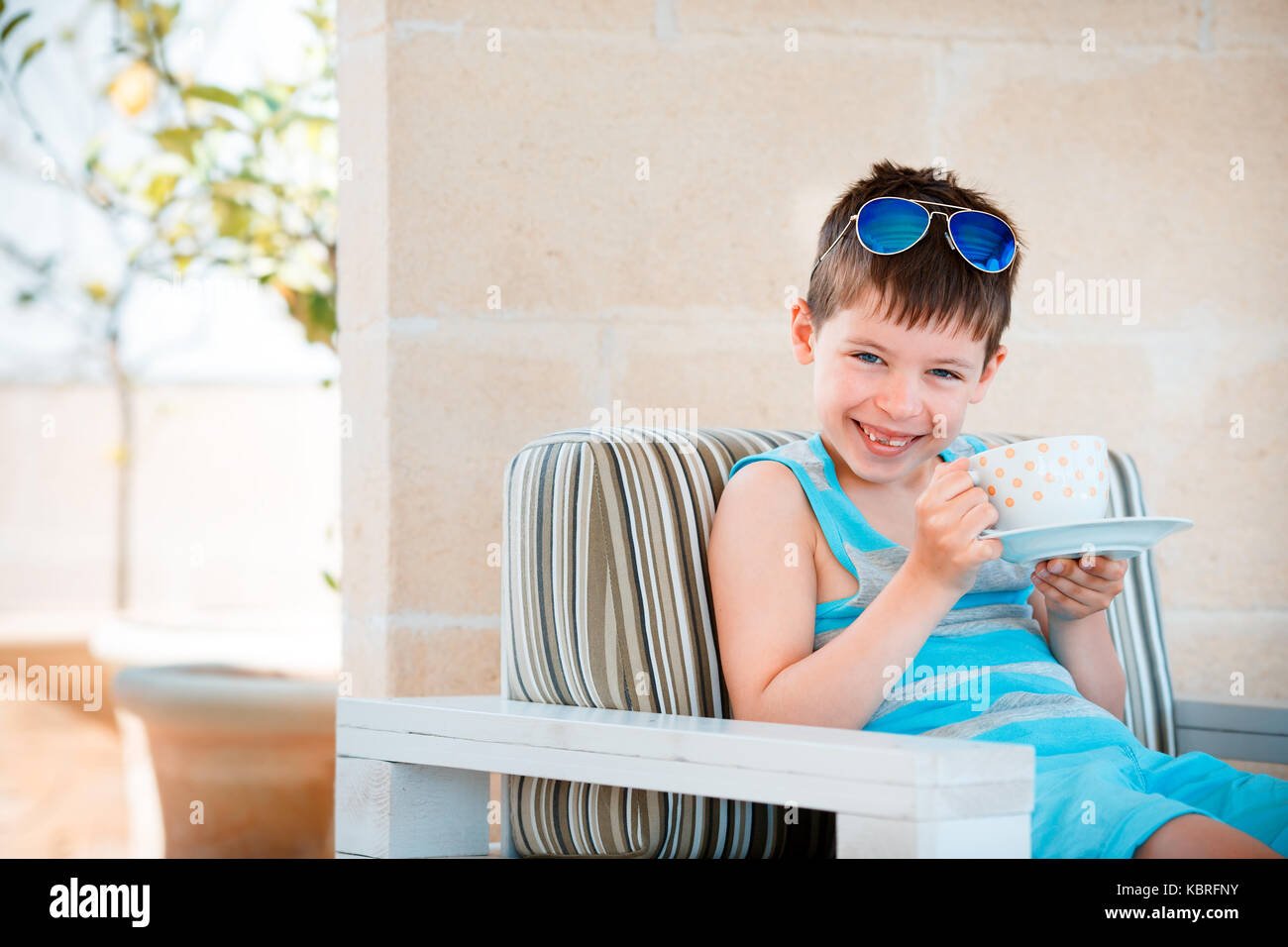 Cute boy drinking tea hi-res stock photography and images - Alamy