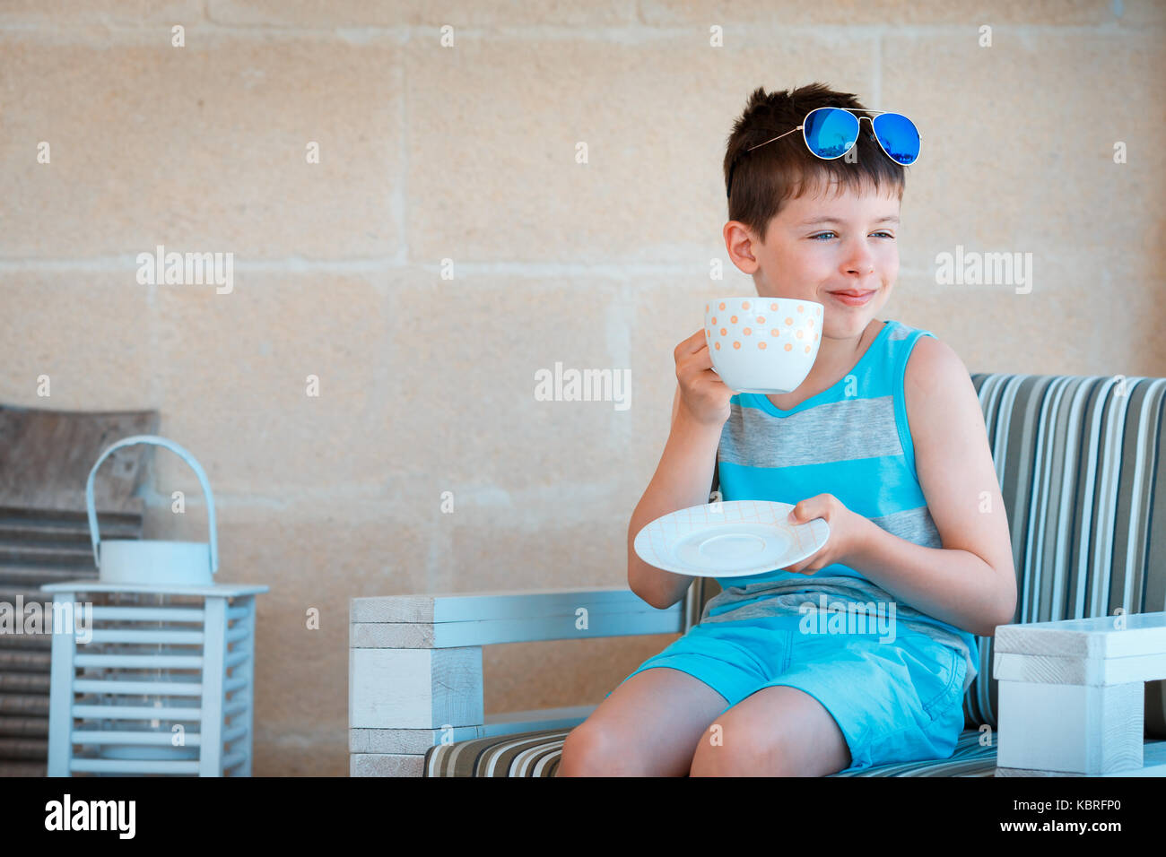 Cute boy drinking tea hi-res stock photography and images - Alamy