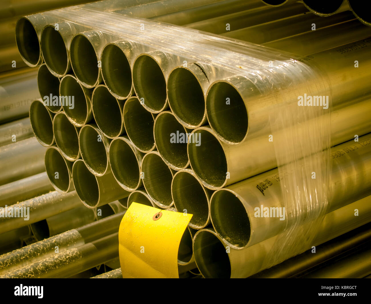 Stack of Many Pipes at the Construction Site Stock Photo - Alamy