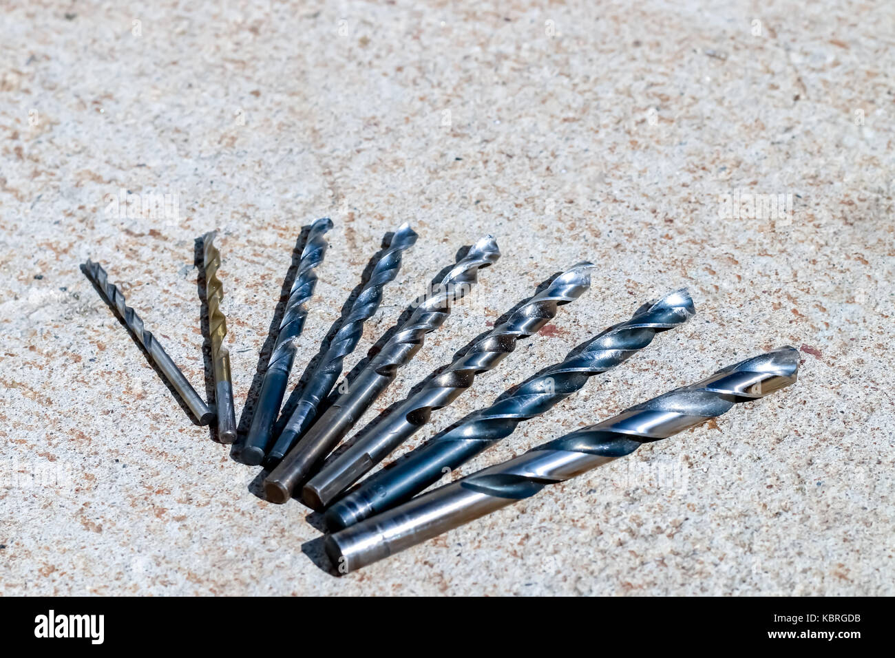 The Isolated Drill Bits with the Gray Ground Background Stock Photo - Alamy