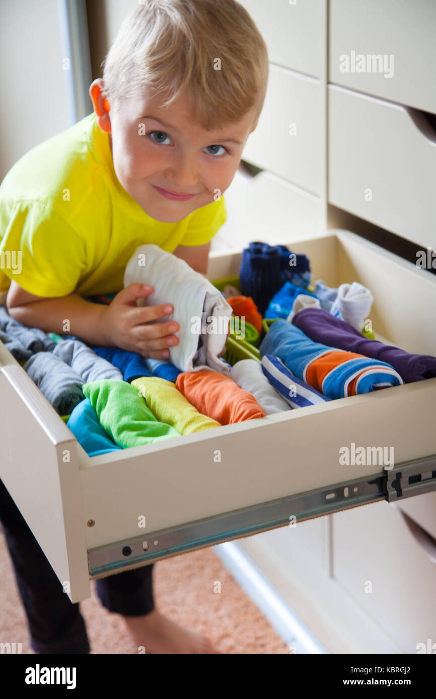 Child pulls on his pants hi-res stock photography and images - Alamy