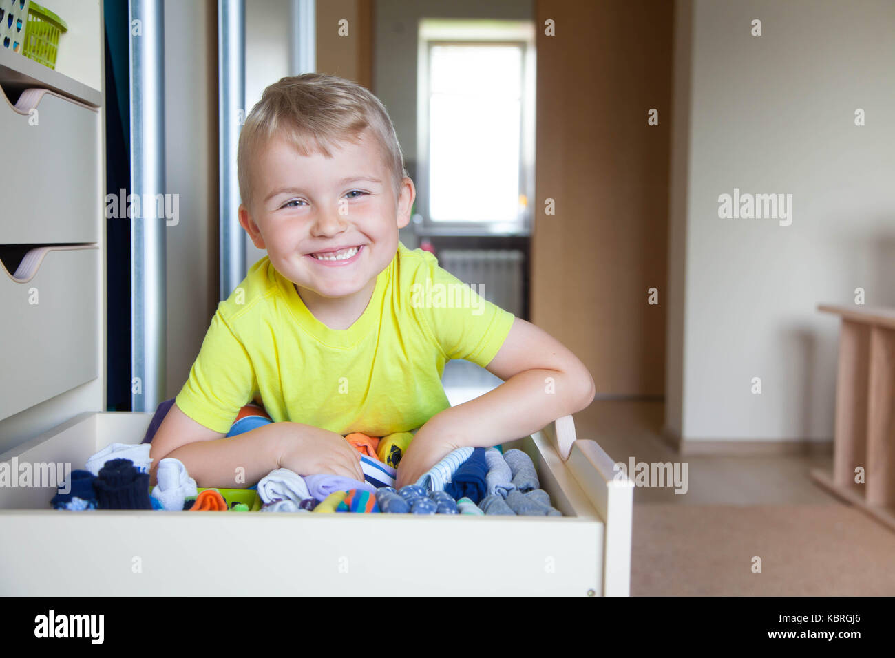 Child pulls on his pants hi-res stock photography and images - Alamy
