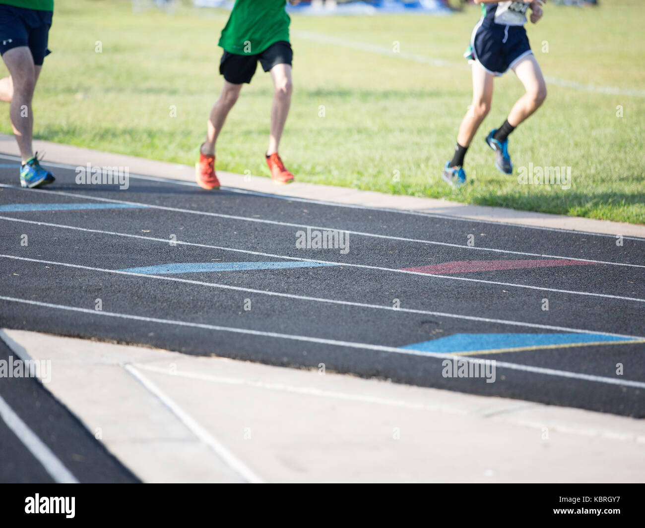 Black Running Surface with white curved lane, lane way Stock Photo - Alamy