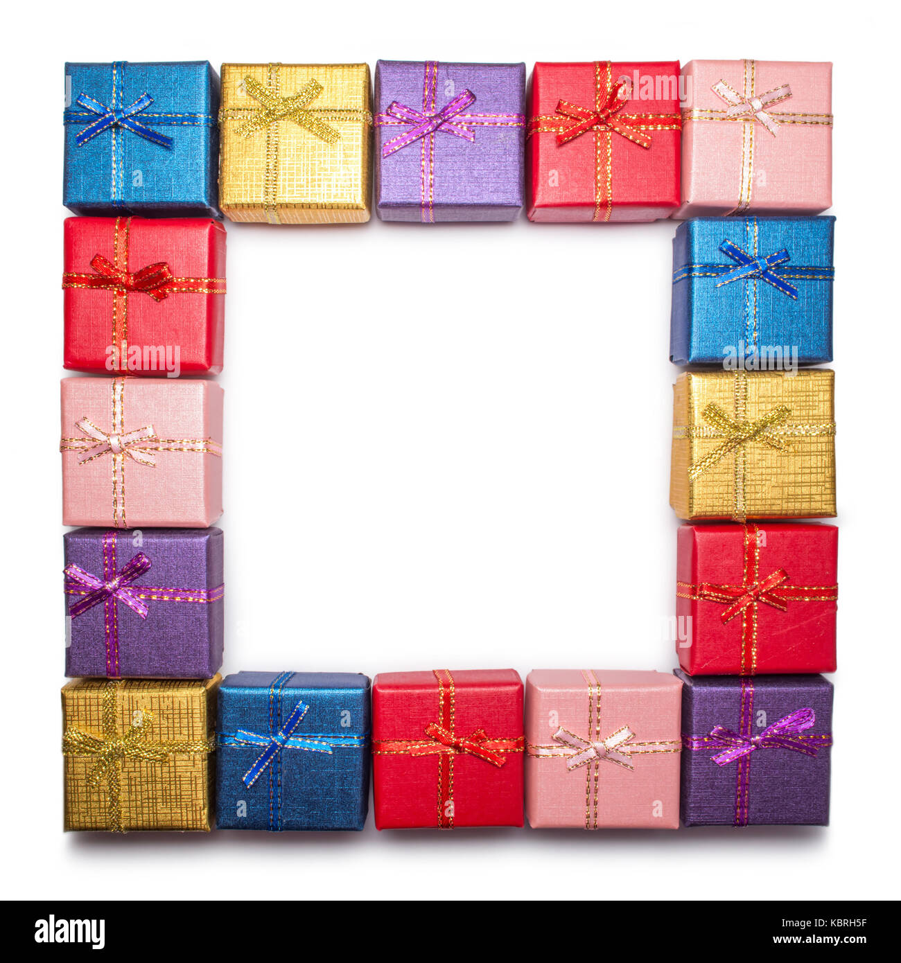 A frame of gift boxes isolated on white background. Colored Christmas ...