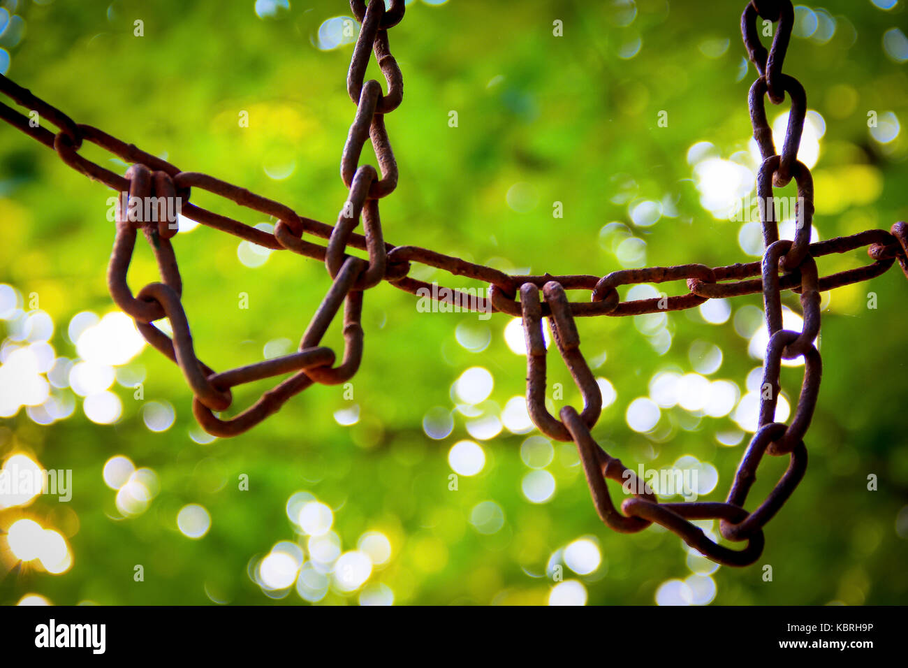 Chain link in Colorful Bokeh Background Stock Photo - Alamy