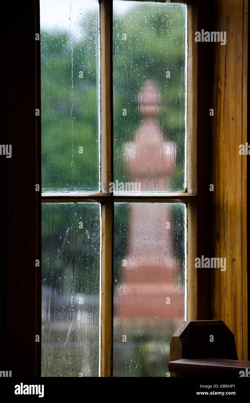 Gravestone through church window, Pirinoa, Wairarapa, New Zealand Stock ...
