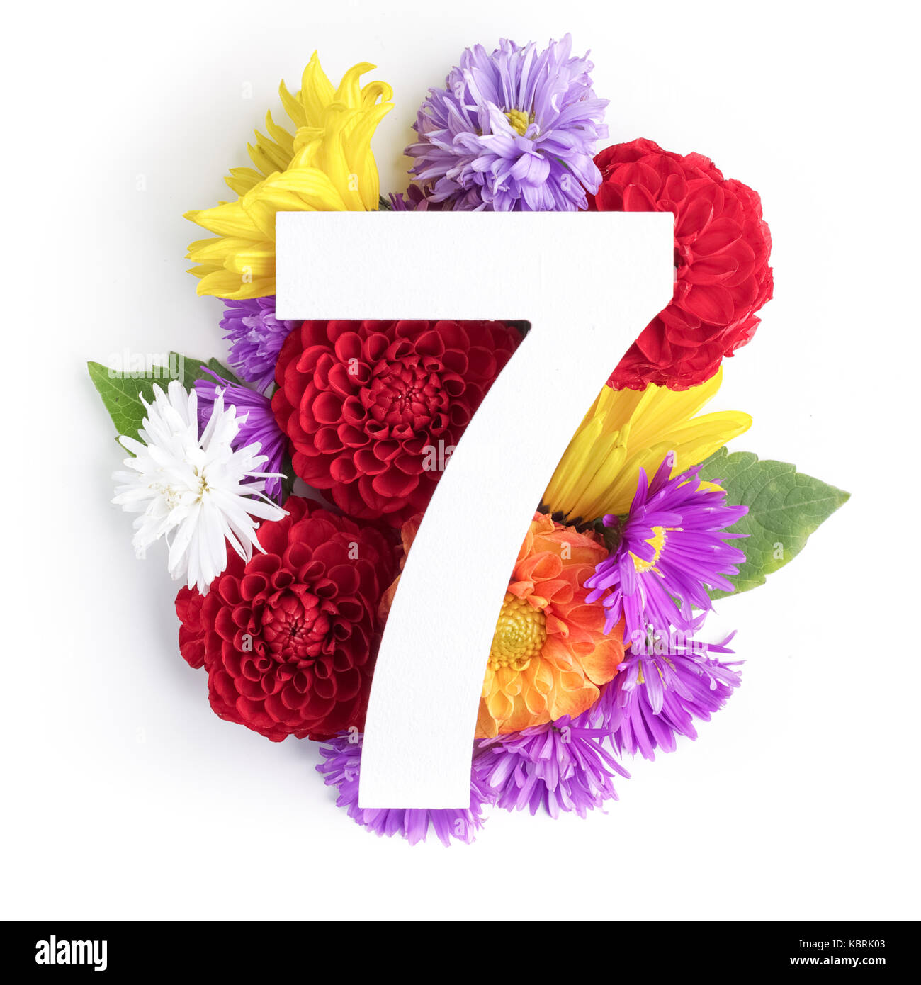 Layout with colorful flowers, leaves and number seven. Flat lay. Top ...