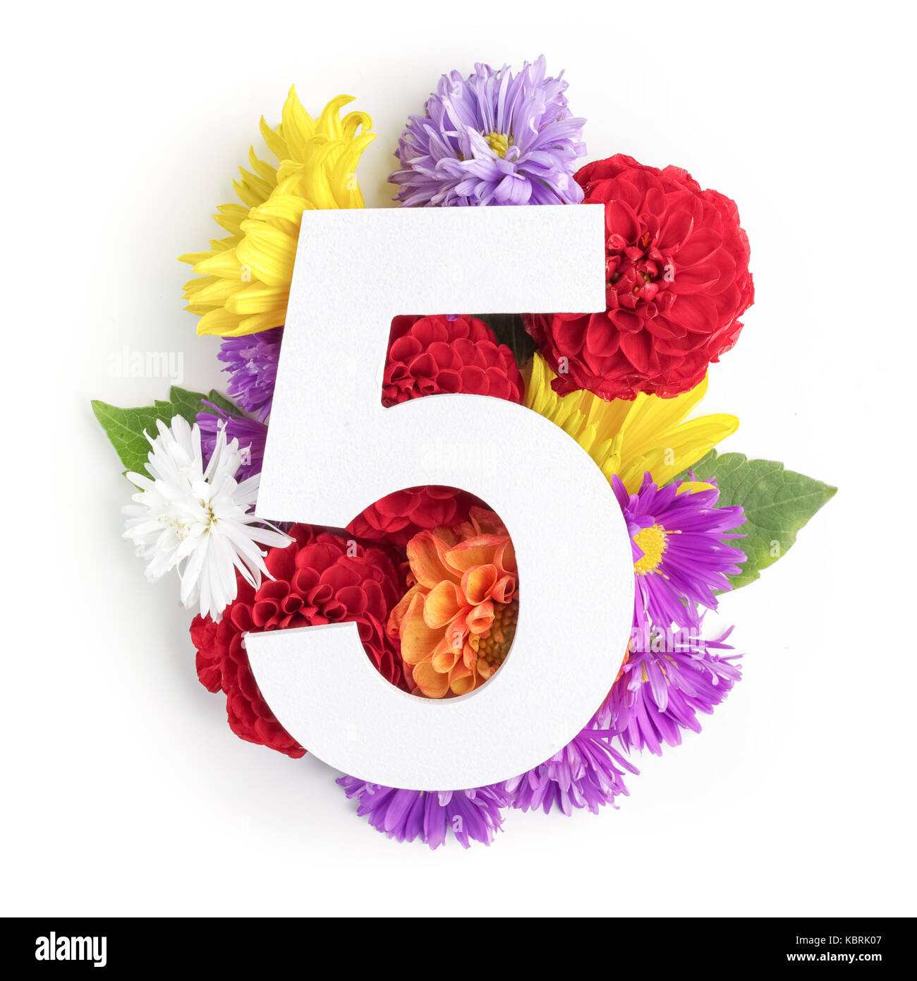 Layout with colorful flowers, leaves and number five. Flat lay. Top ...