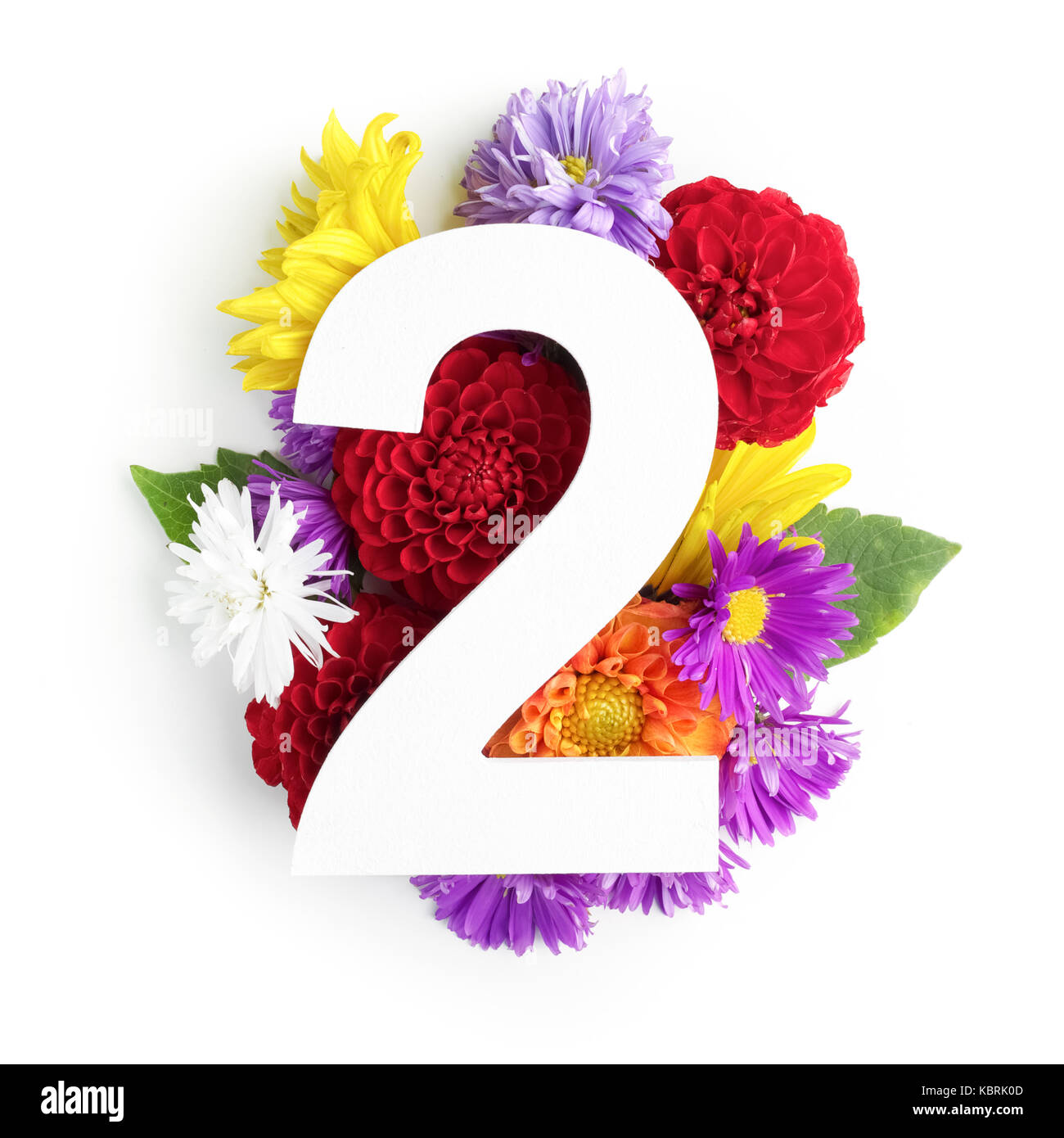 Layout with colorful flowers, leaves and number two. Flat lay. Top view ...