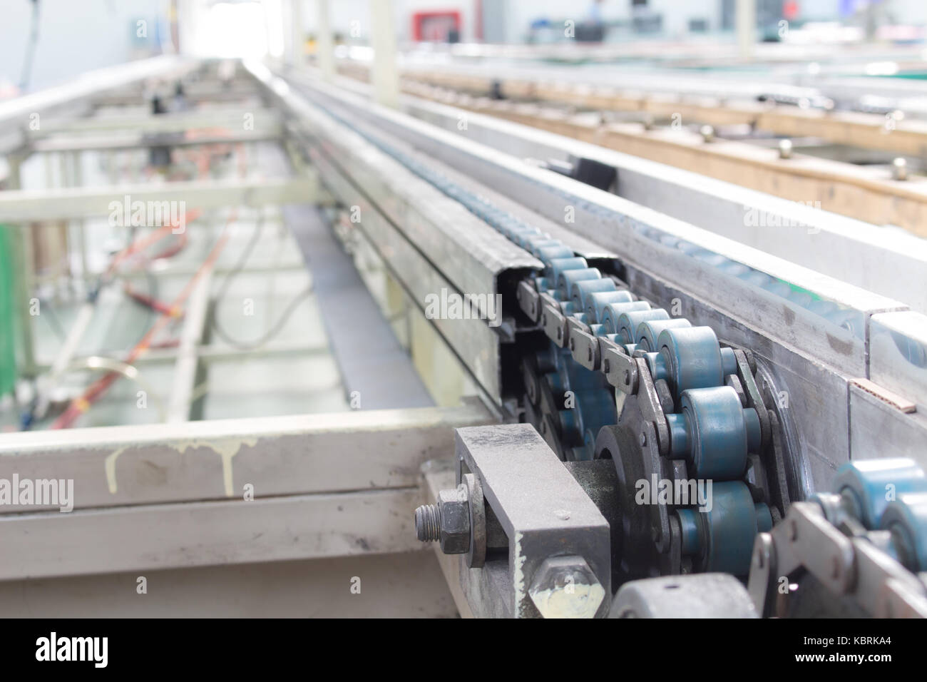 the chain drive shaft Line Conveyor Industrial Stock Photo - Alamy