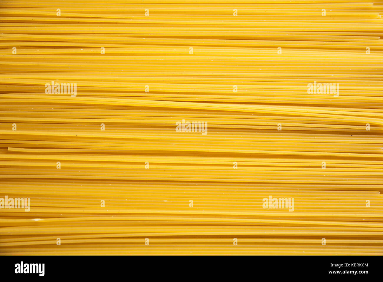 Raw spaghetti full image Stock Photo - Alamy