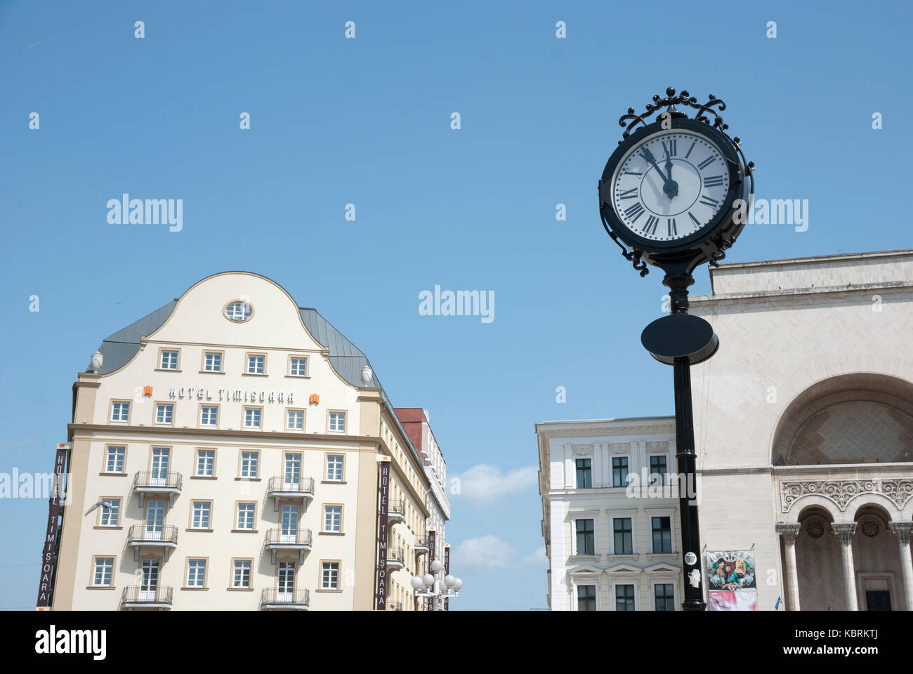 Main square with clock in Timisoara, Romania Stock Photo - Alamy