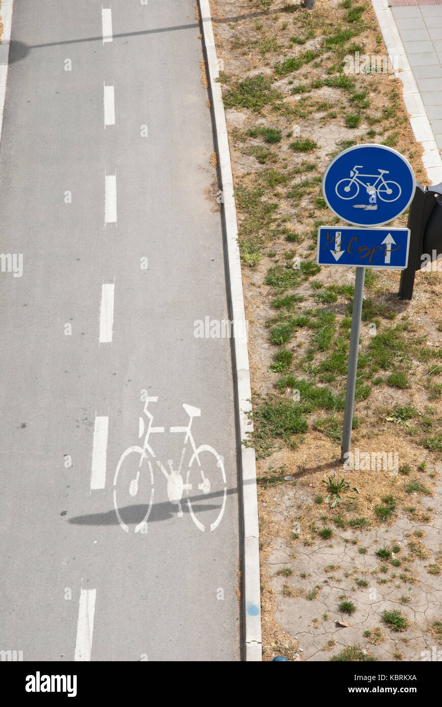 Cycling path with sign Stock Photo - Alamy