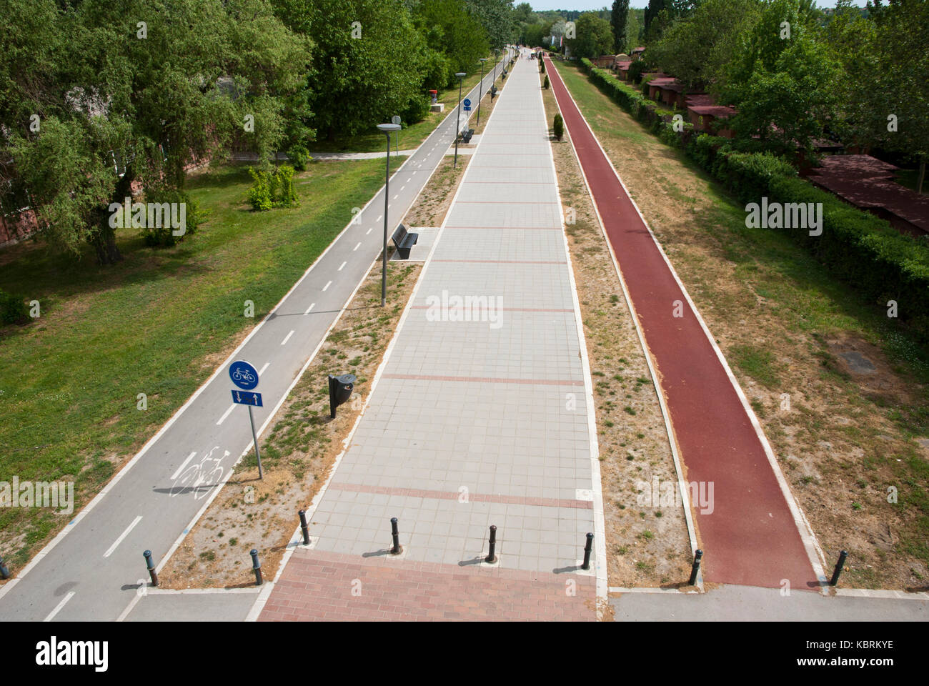 Cycling path with sign Stock Photo - Alamy