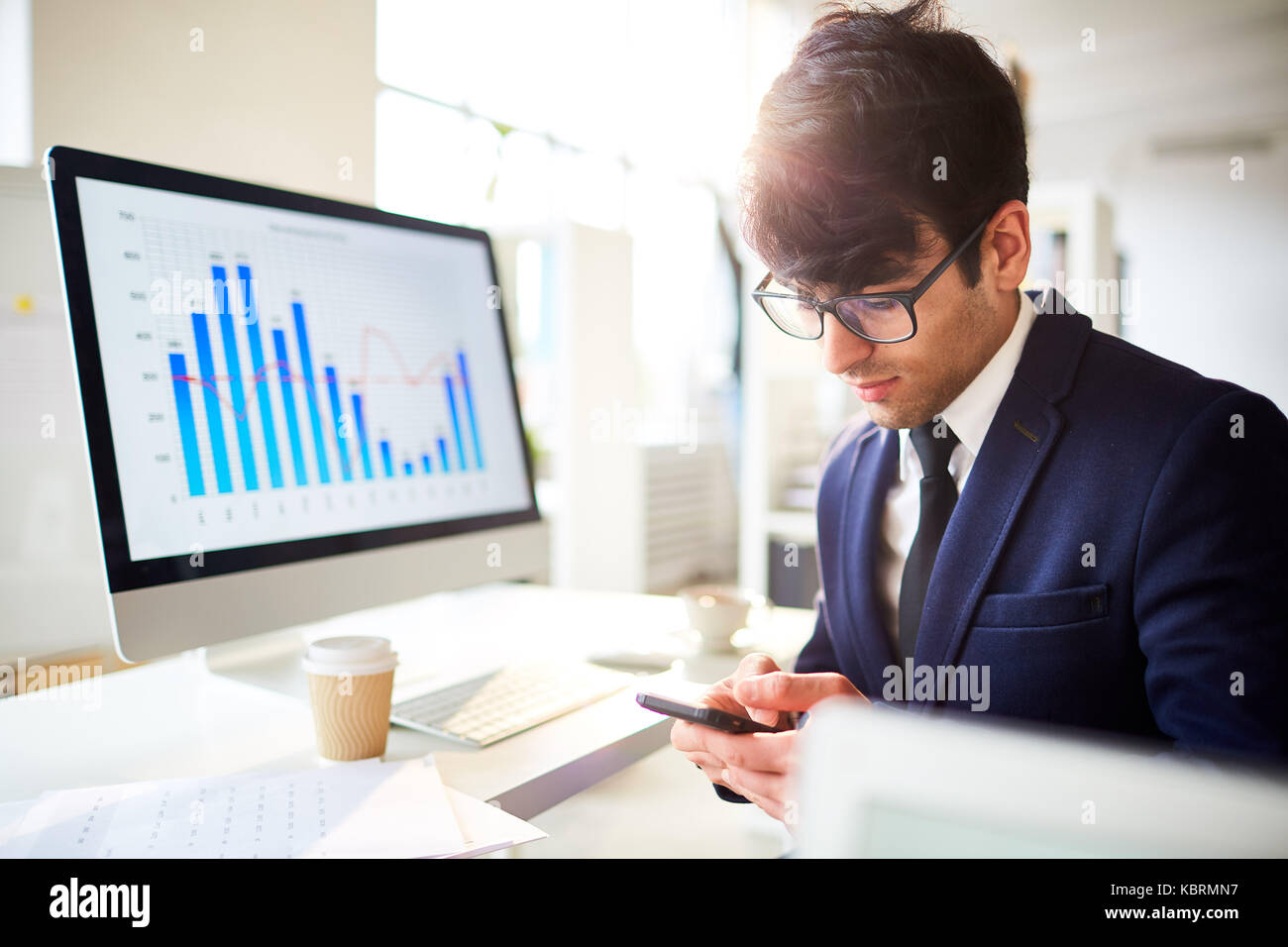 Messaging by workplace Stock Photo - Alamy