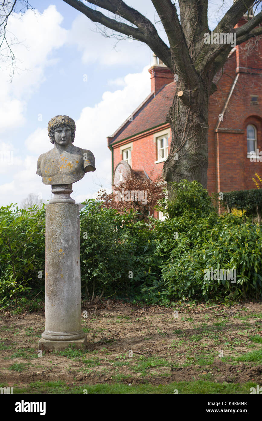 Statue in a garden in Kent Stock Photo - Alamy