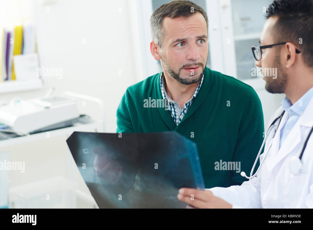 Appointment at Doctors Office Stock Photo - Alamy