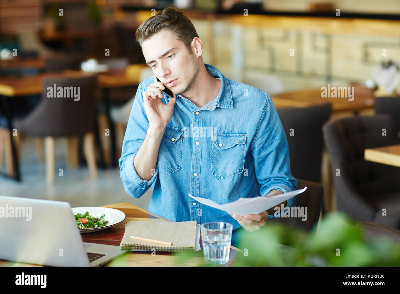 Working by lunch Stock Photo - Alamy