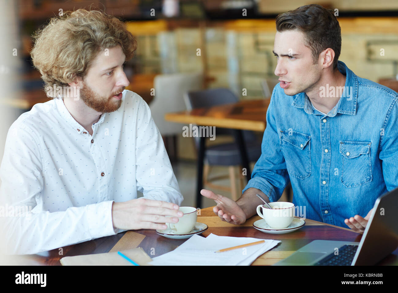 Brainstorming during discussion Stock Photo - Alamy