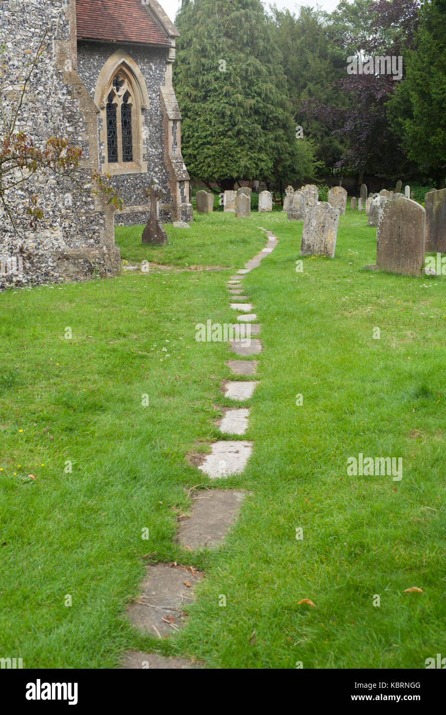 Curved footpath by a church Stock Photo - Alamy