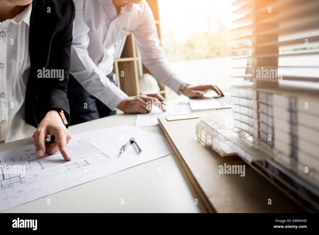 Person's engineer Hand Drawing Plan On Blue Print with architect ...