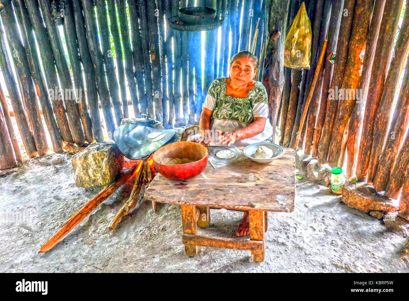 Mayan woman working in wooden hut near Ek Balam Mexico Stock Photo - Alamy