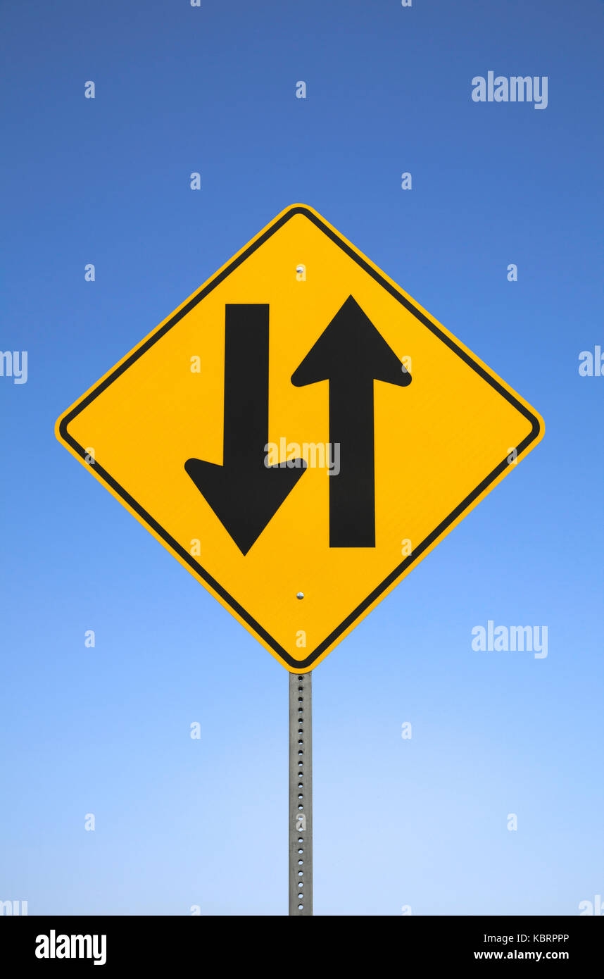 Two way road sign Stock Photo - Alamy