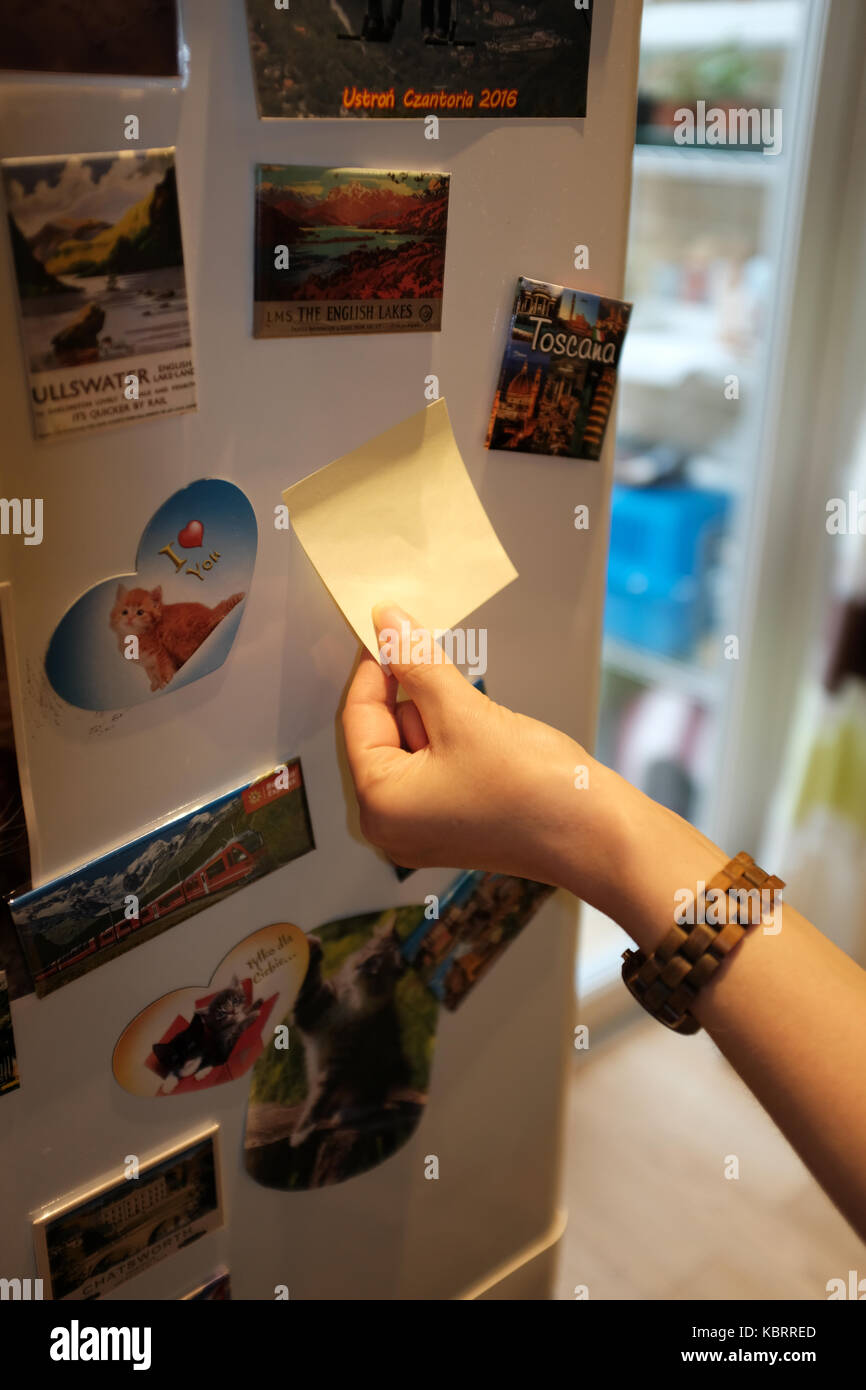 Putting On Fridge Door High Resolution Stock Photography and Images - Alamy