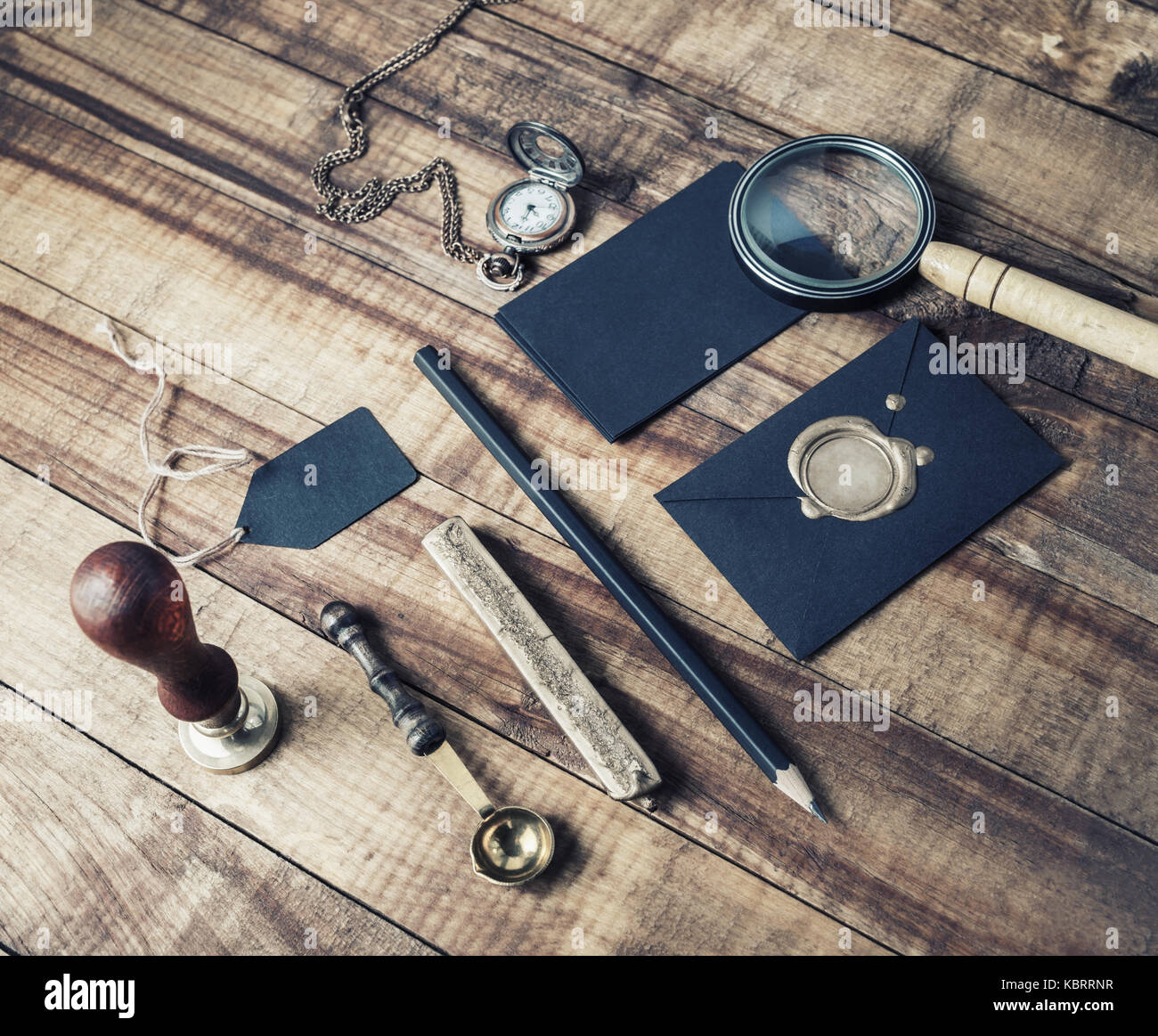 Vintage stationery elements on wood table background. Mock-up for your ...