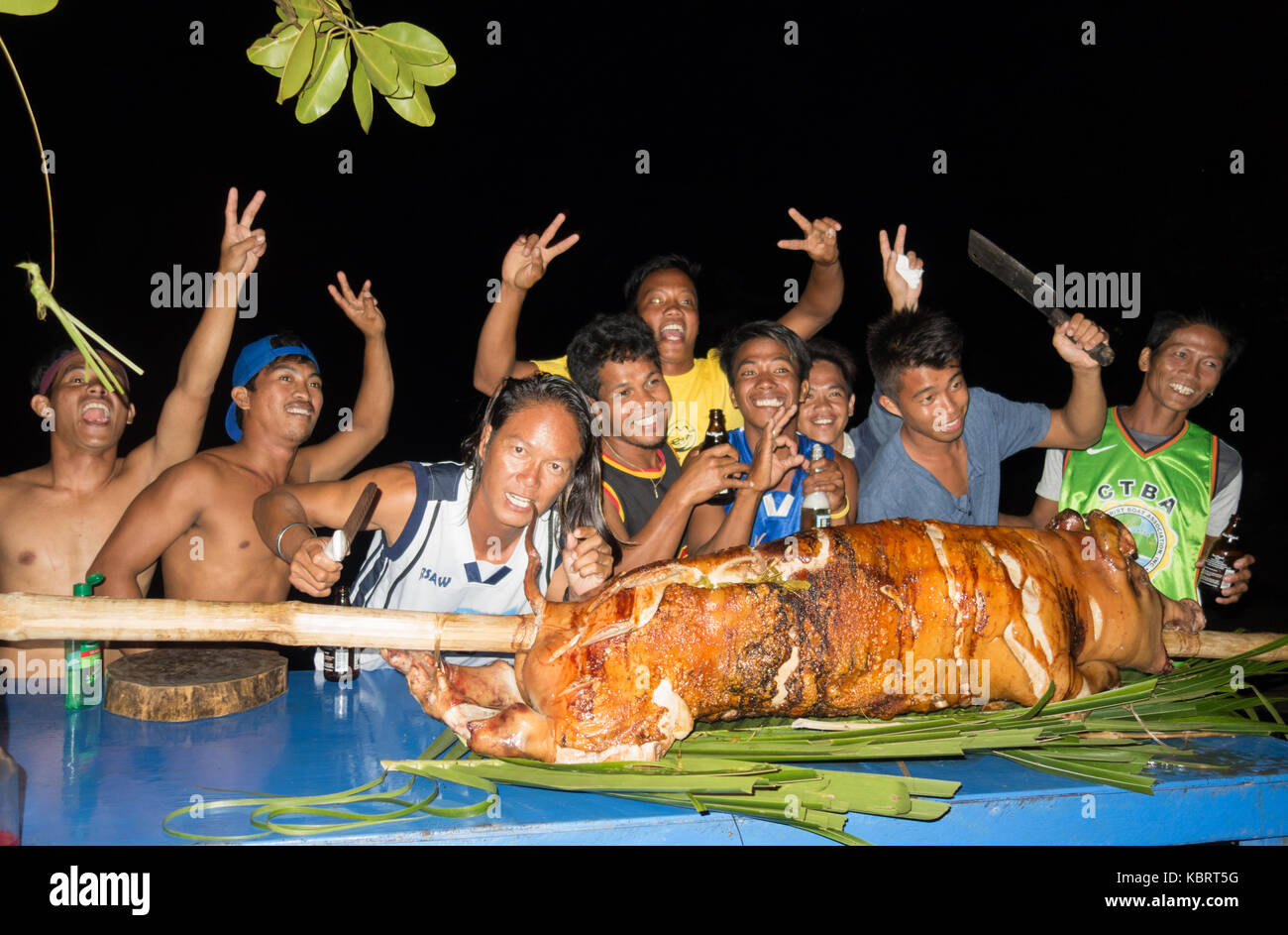 Philippines holiday - staff and prepared hog roast, Tao farm, El Nido ...