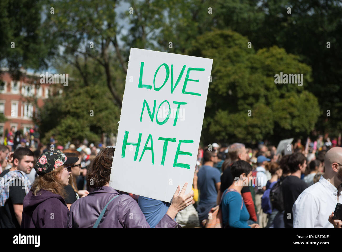 Washington, DC, USA. 30th Sep, 2017. Marchers hold their signs high in ...