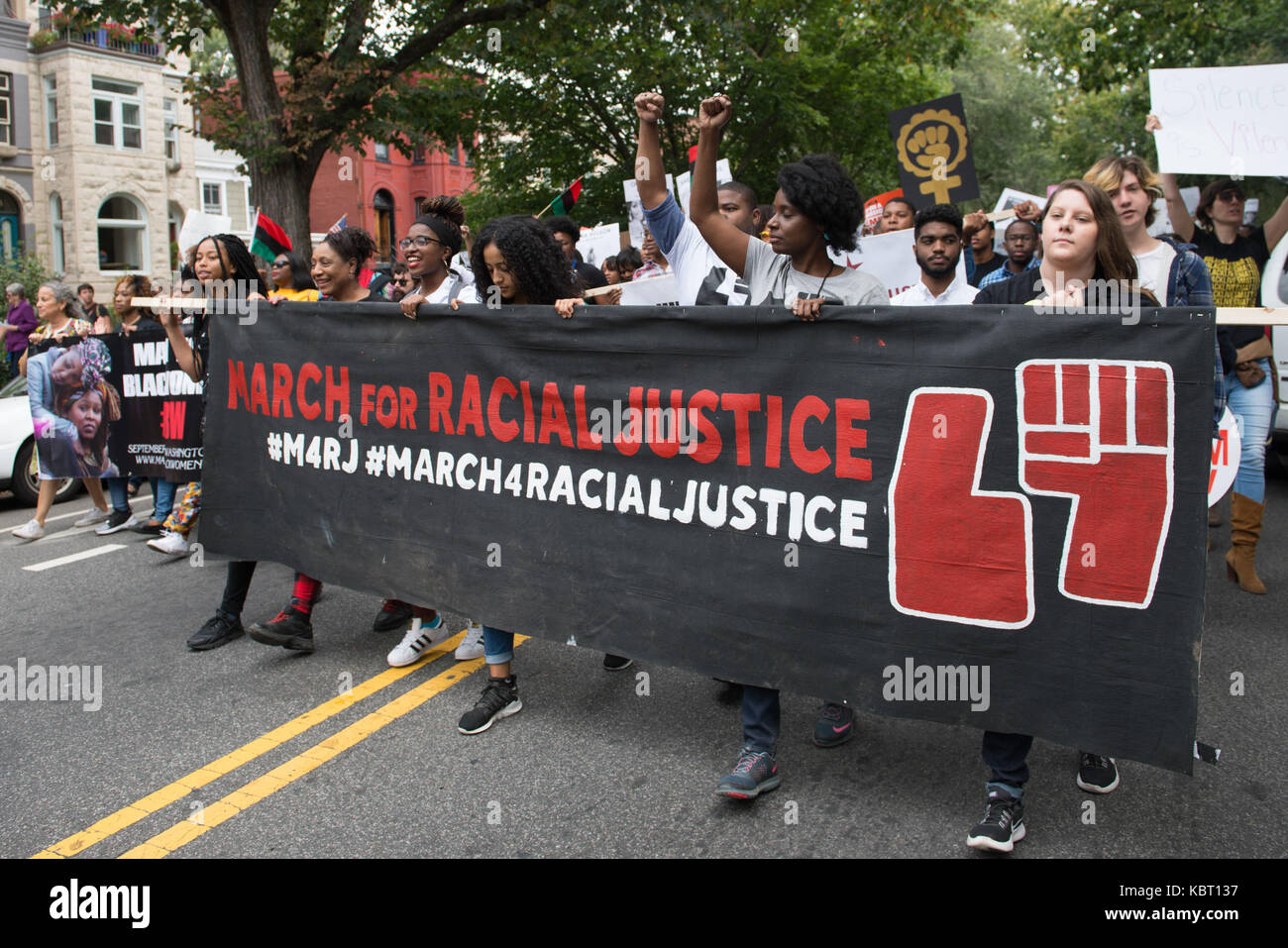 Washington, DC, USA. 30th Sep, 2017. Marchers peacefully march down ...