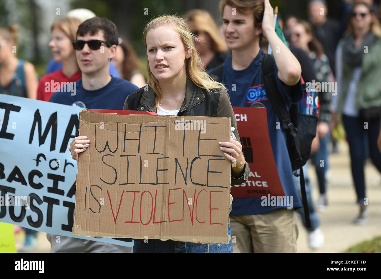Washington, DC, USA. 30th Sep, 2017. Marchers peacefully march near the ...