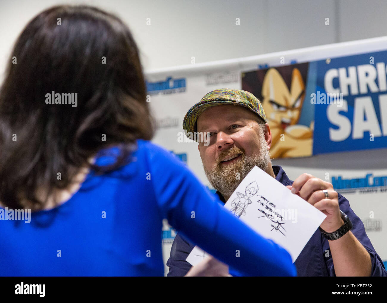 Tampa, Florida, USA. 30th Sep, 2017. Chris Sabat interacts with a fan ...