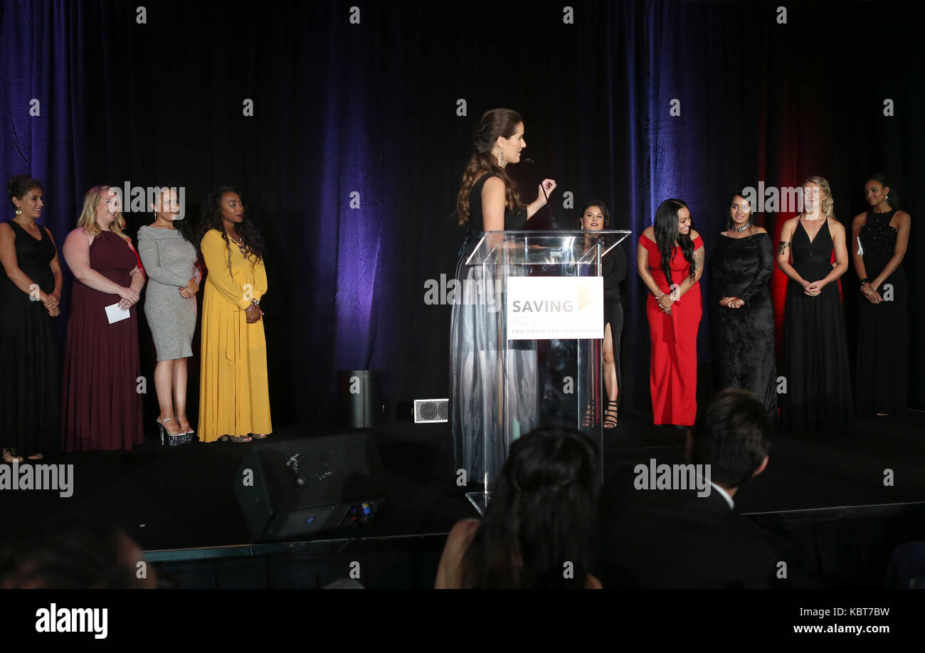HOLLYWOOD, CA - SEPTEMBER 30: Amber Davies with Saving Innocence Team ...