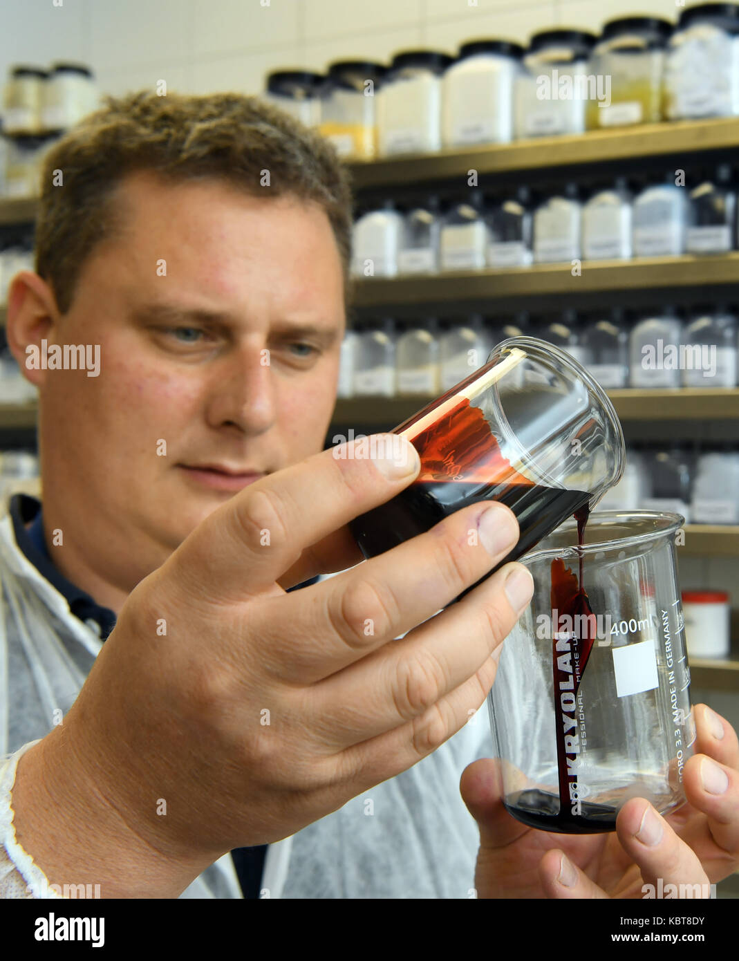Berlin, Germany. 21st Sep, 2017. Lab manager Jochen Gottfriedsen fills ...