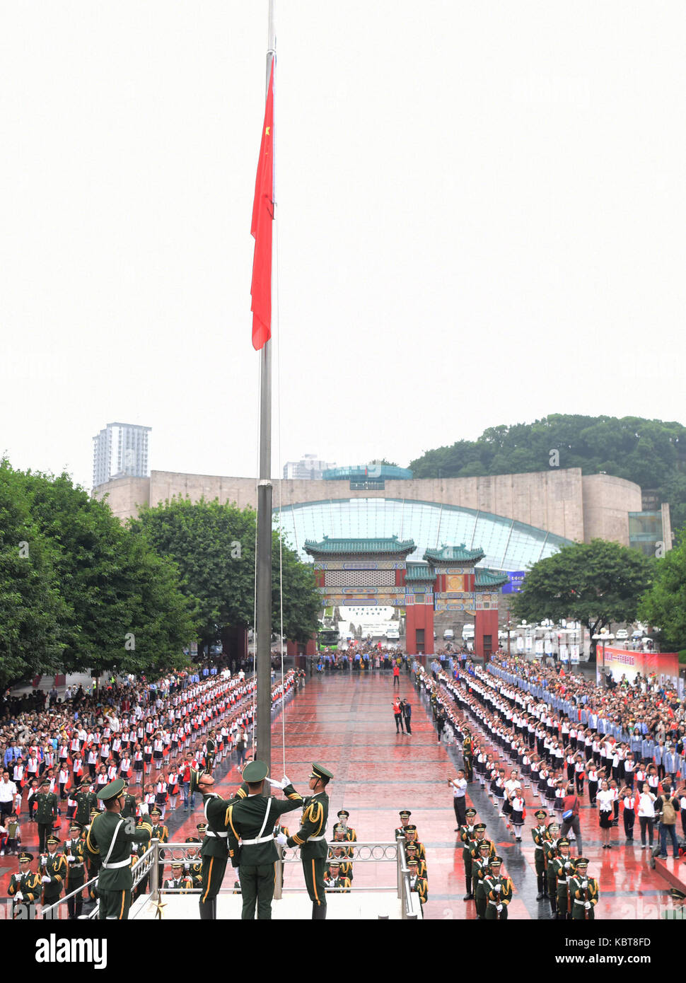 Chongqing, China. 1st Oct, 2017. A national flag-raising ceremony is ...